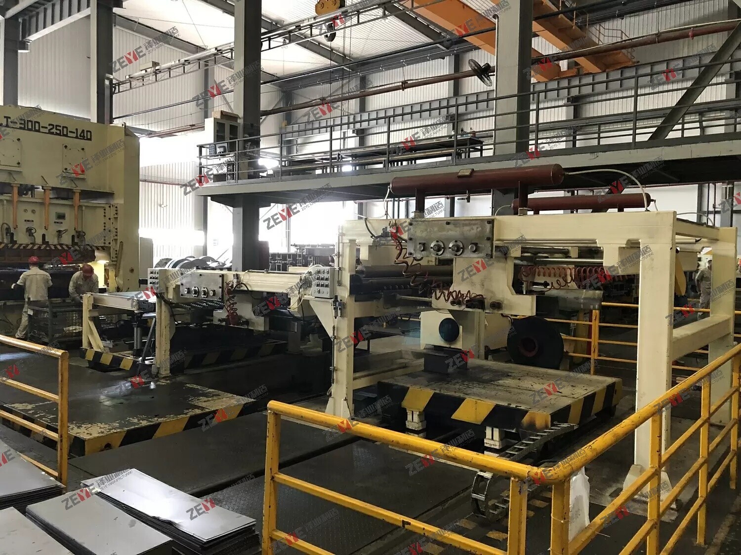 Punching and blanking line for precision metal fabrication